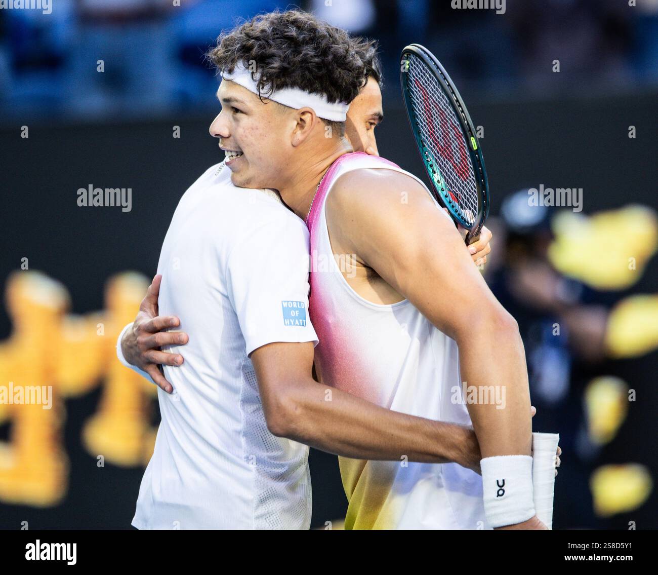 Melbourne, Australia. 22nd Jan, 2025. Ben Shelton (R) hugs Lorenzo Sonego after the men's ...