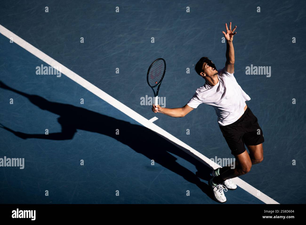 Melbourne, Australia. 22nd Jan, 2025. Lorenzo Sonego serves during the men's singles ...