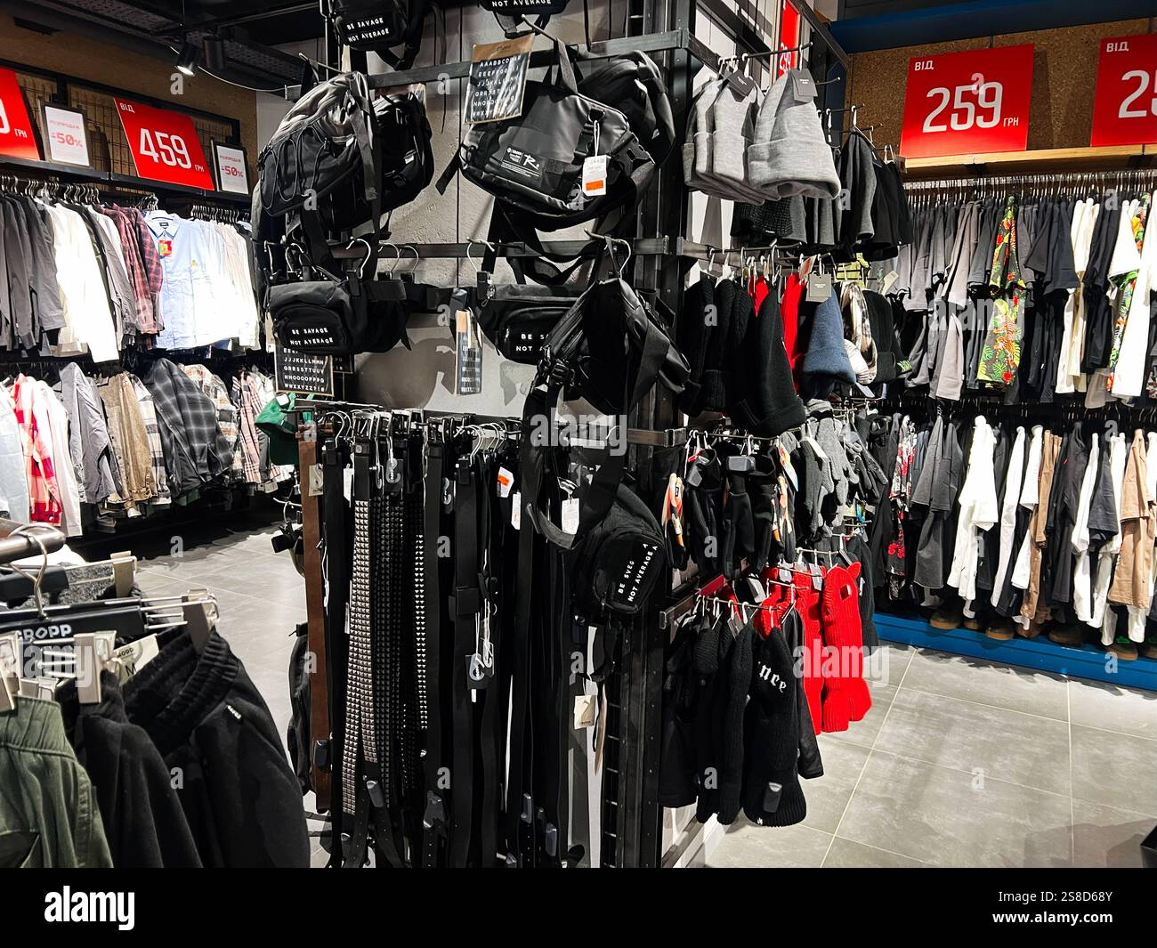 Kyiv, Ukraine - January 21, 2025: Fashion store featuring racks of ...