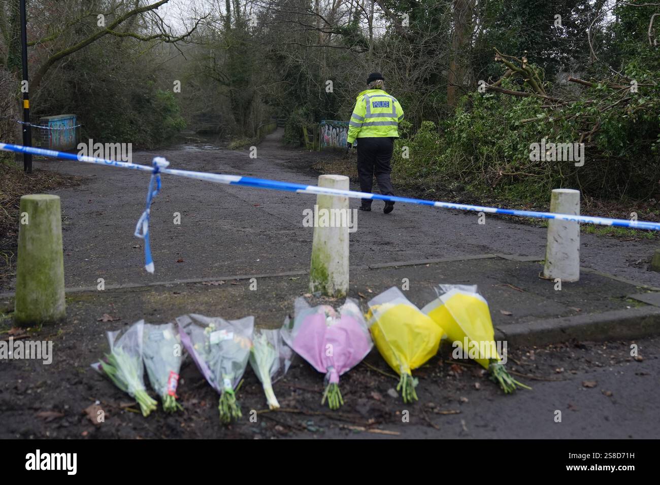 Flowers at the scene near Scribers Lane in the Hall Green area of ...