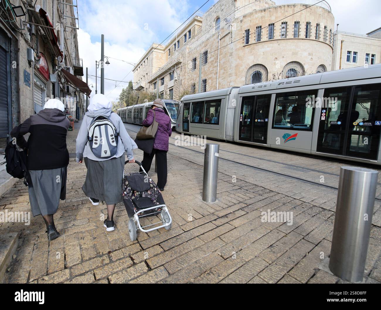 People walk along Jaffa Street in Jerusalem on Dec. 13, 2024. Photo by ...