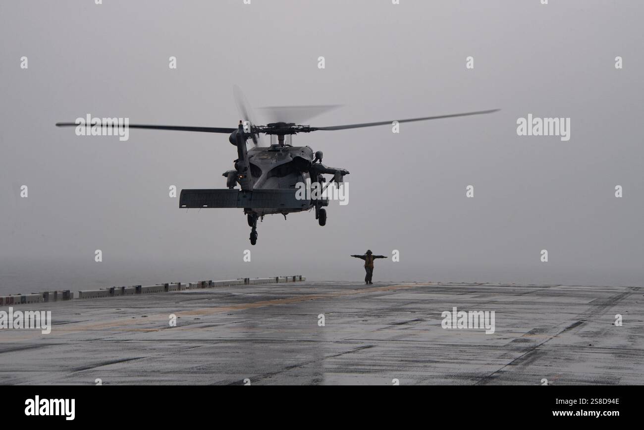 250119-N-PV363-1152 PHILIPPINE SEA (Jan. 19, 2025) An MH-60S Seahawk ...