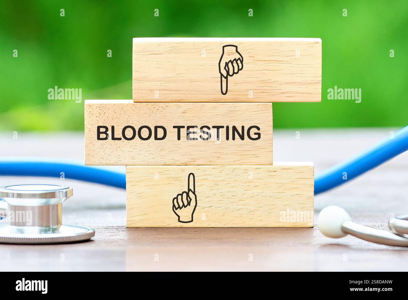 Focus on blood testing materials arranged creatively beside medical ...