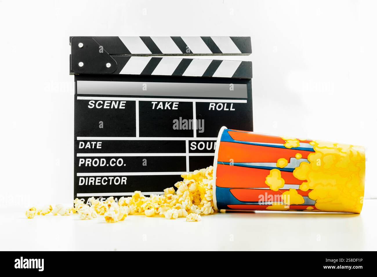 popcorn box with clapper board Stock Photo - Alamy