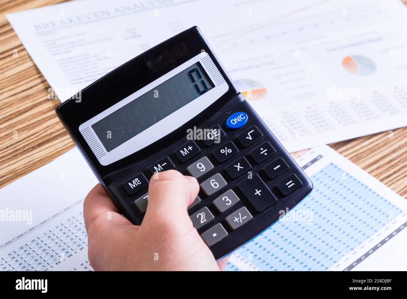 Graphs and Calculator Stock Photo - Alamy