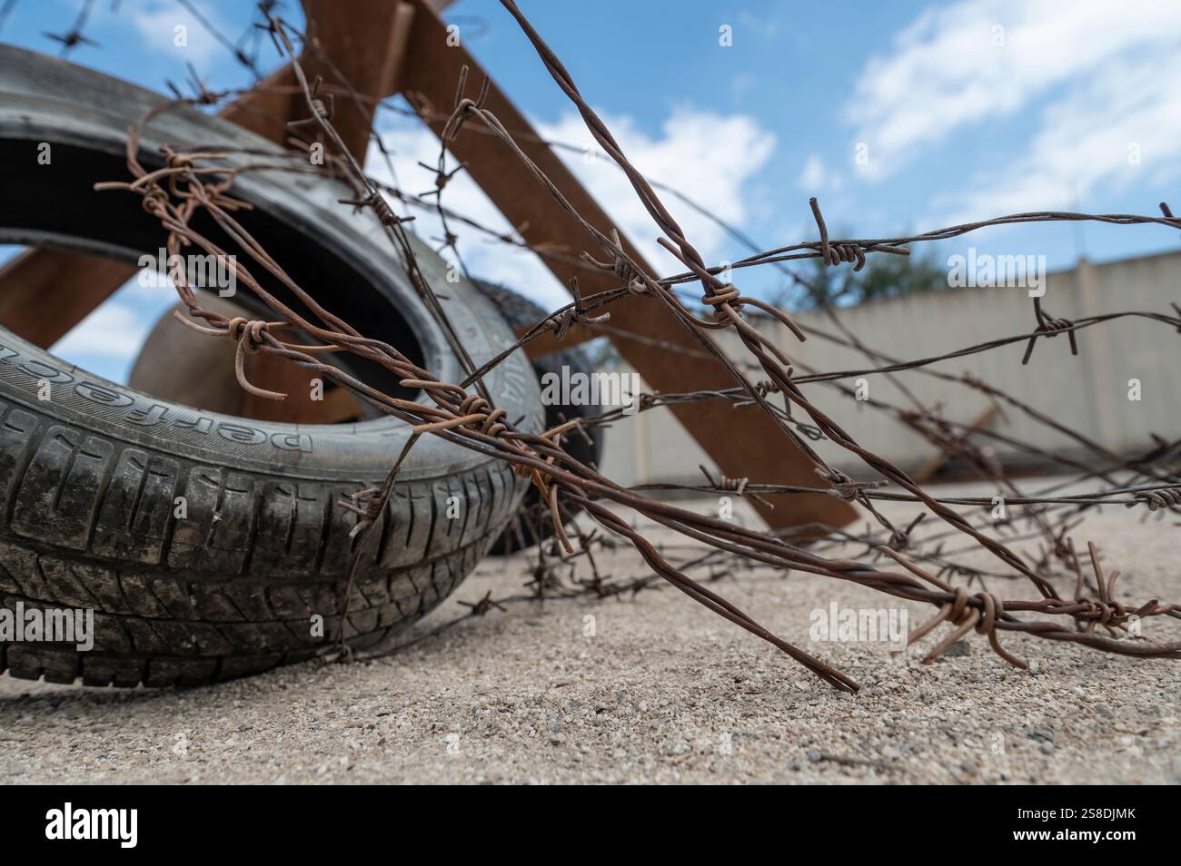 Road fence with barbed wire Stock Photo - Alamy