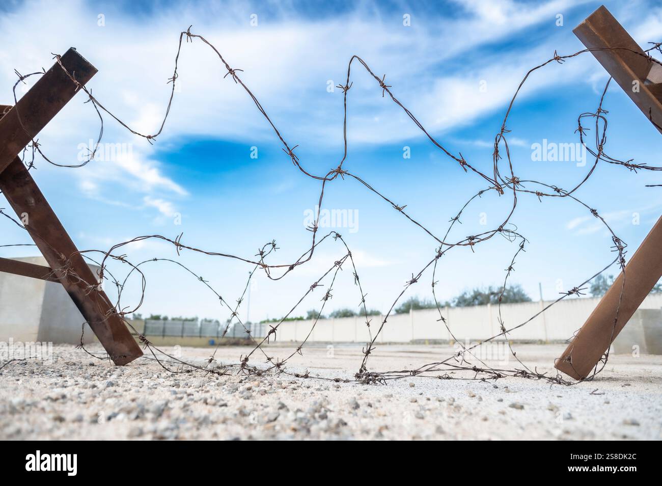 Road fence with barbed wire Stock Photo - Alamy