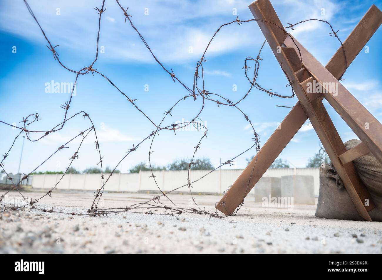 Road fence with barbed wire Stock Photo - Alamy