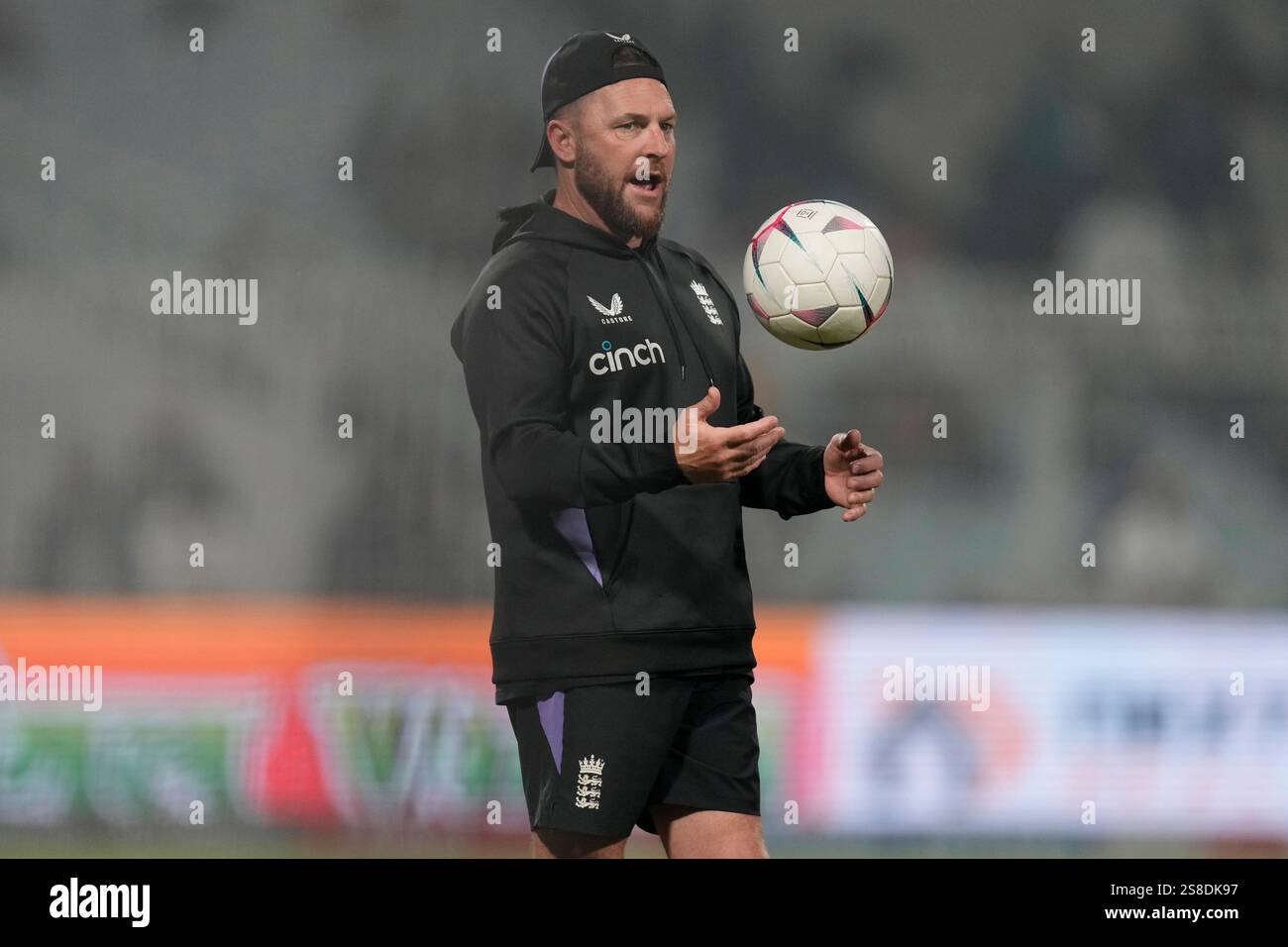 England head coach Brendon McCullum plays with a soccer ball before the ...