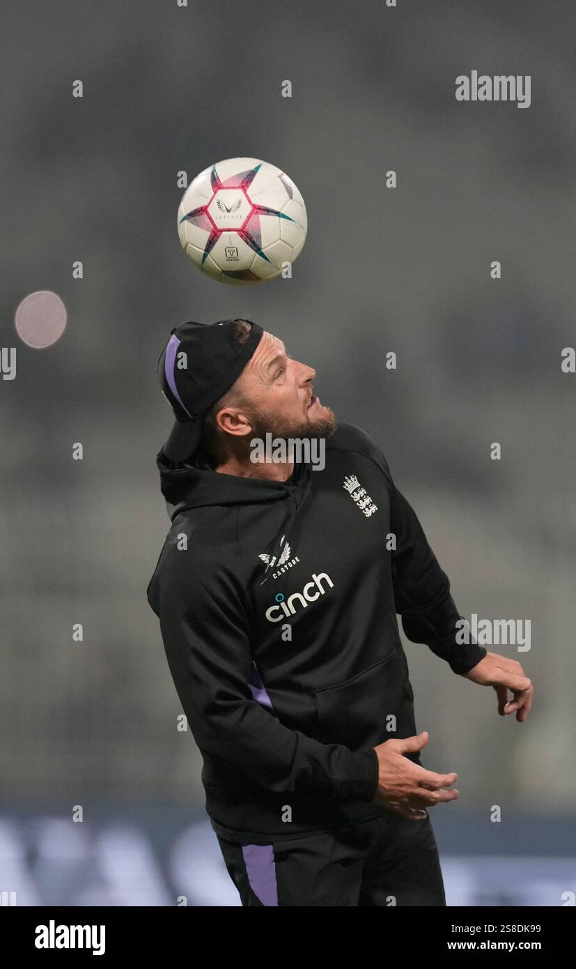 England head coach Brendon McCullum plays with a soccer ball before the ...