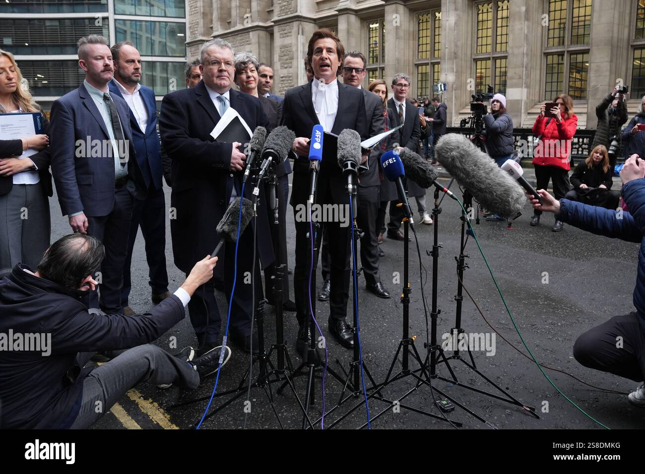 Lord Tom Watson (centre left) and the Duke of Sussex's barrister, David Sherborne speak to the ...