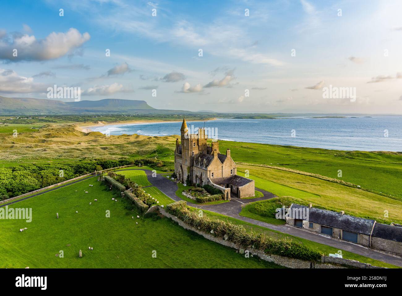 Classiebawn Castle on a backdrop of picturesque landscape of ...
