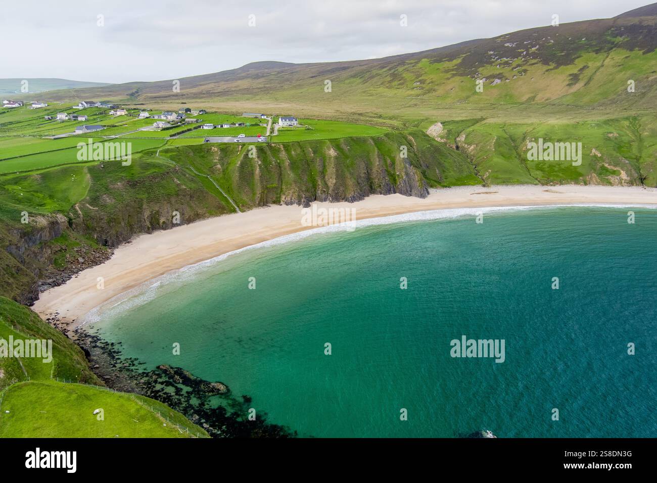 Silver Strand, a sandy beach in a sheltered, horseshoe-shaped bay ...
