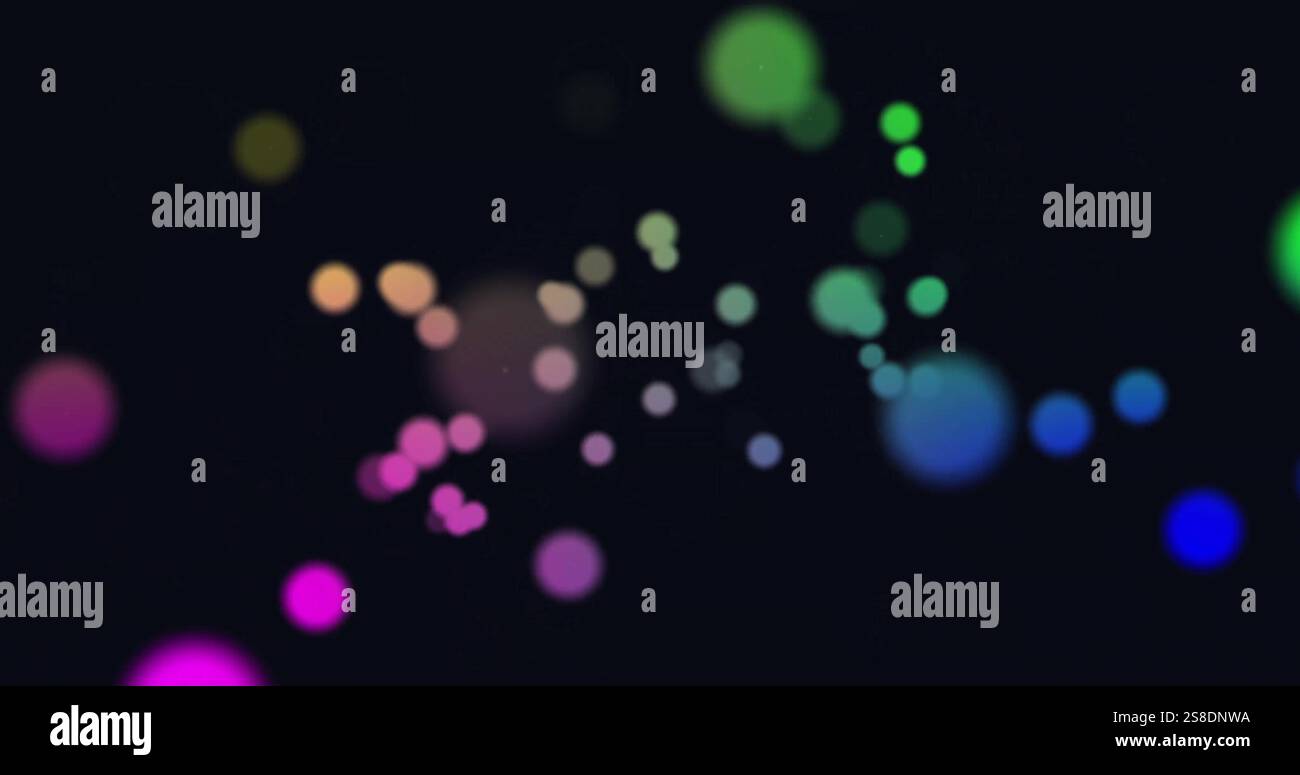 Image of colourful light spots on black background Stock Photo - Alamy