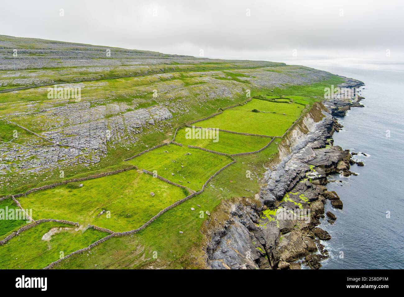 Spectacular misty aerial landscape in the Burren region of County Clare ...