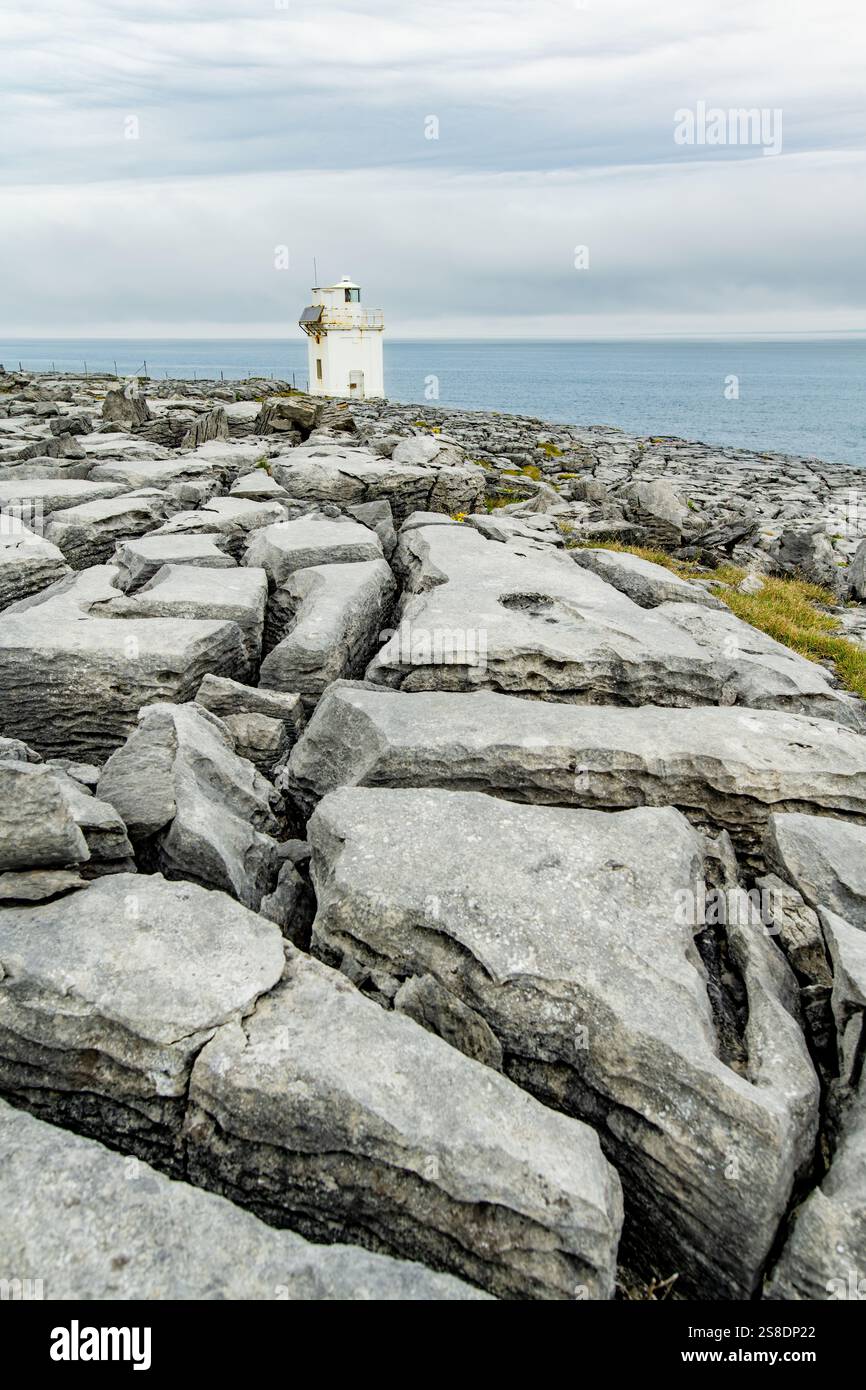 Black Head Lighthouse, situated in the rough rocky landscape of Burren ...