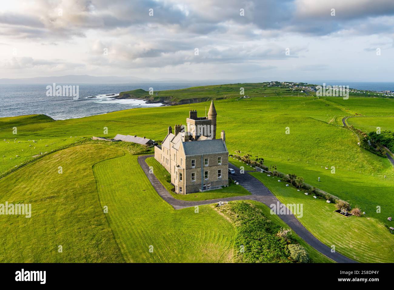 Classiebawn Castle on a backdrop of picturesque landscape of ...