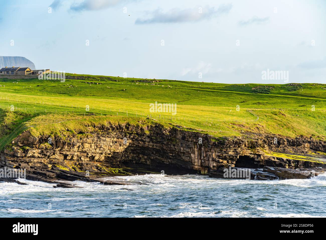 Spectacular view of Mullaghmore Head with huge waves rolling ashore ...