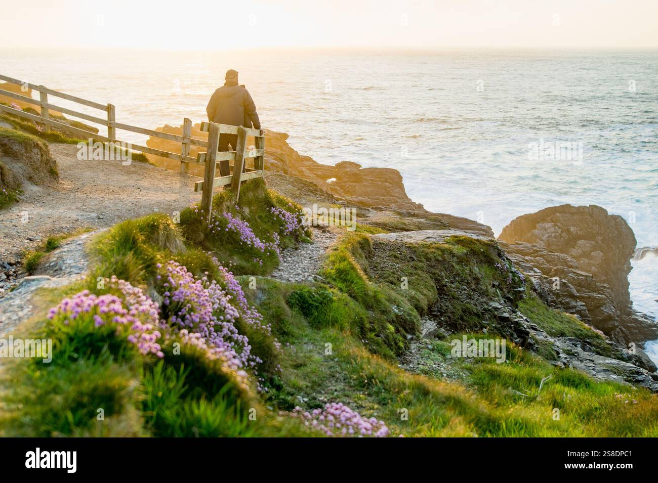 Tourist admiring scenic beauty of Malin Head, Ireland's northernmost ...