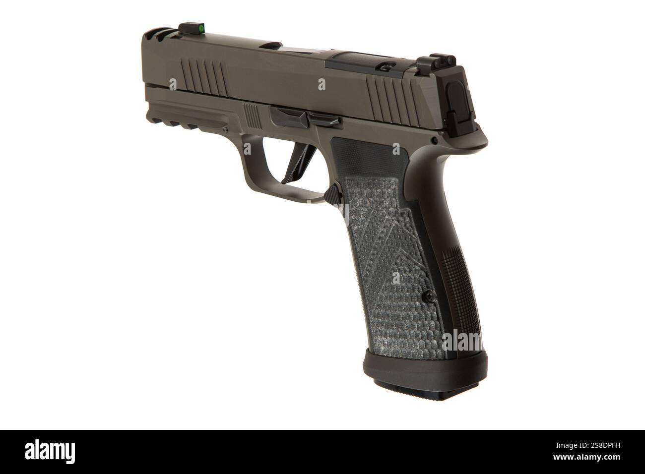 A khaki-colored handgun with a textured grip and modern design ...