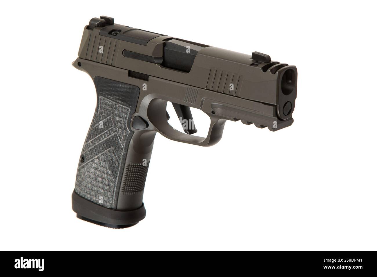 A khaki-colored handgun with a textured grip and a sleek design ...