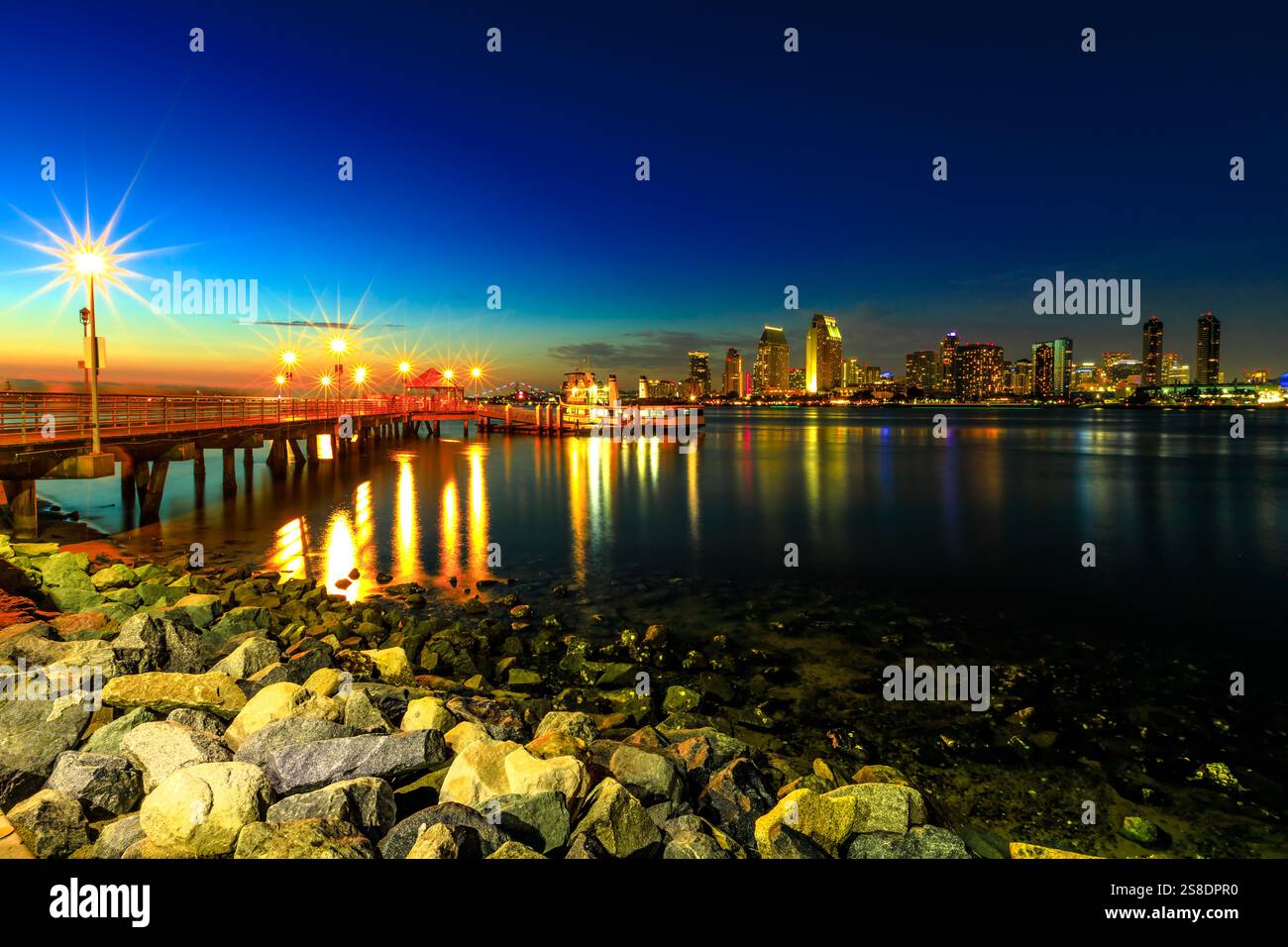 Scenic night view of Coronado pier with ferry boat docked on Coronado ...