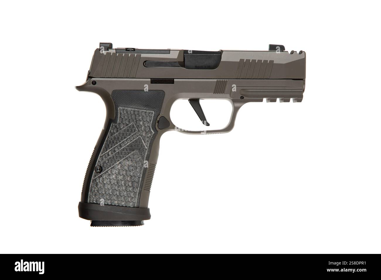 A modern semi-automatic handgun with a textured grip, visible trigger ...