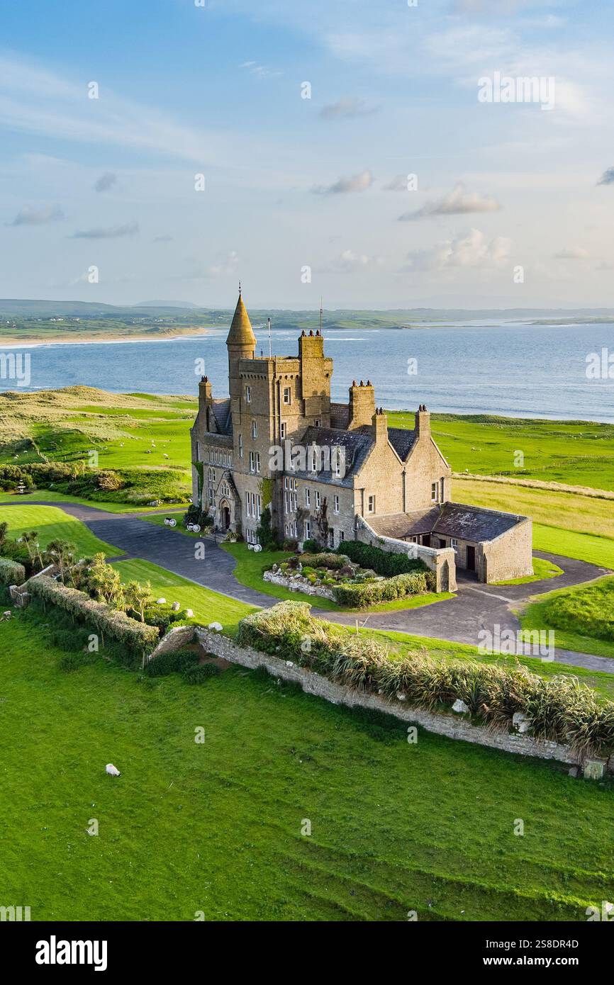 Classiebawn Castle on a backdrop of picturesque landscape of ...