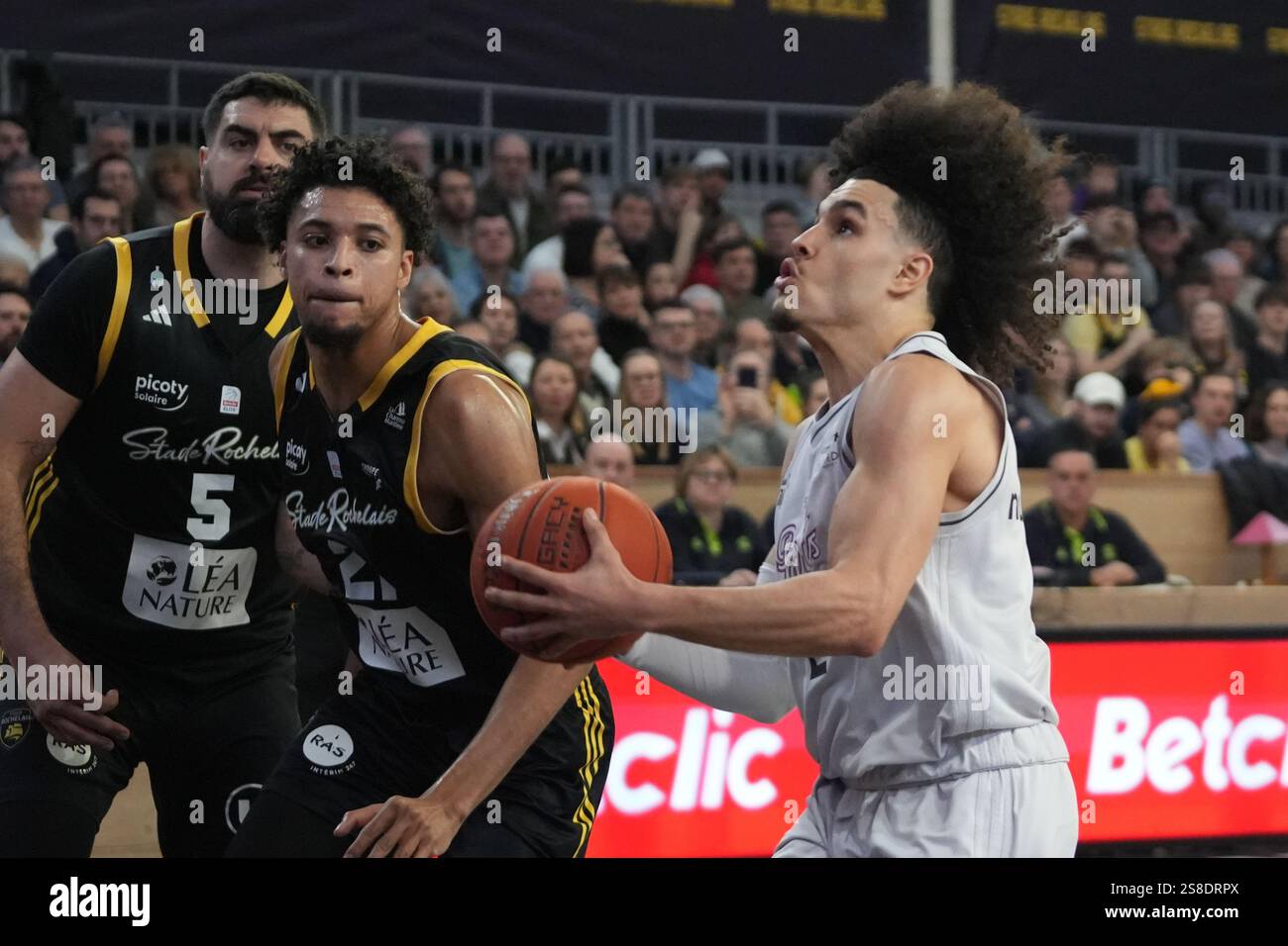 21 Clifton Moore of Stade rochelais and 2 Nadir Hifi of Paris Basket ...