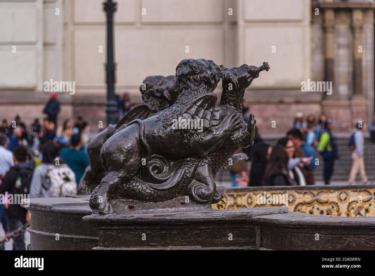 Lion Statue of the Lima Main Square's fountain Stock Photo - Alamy