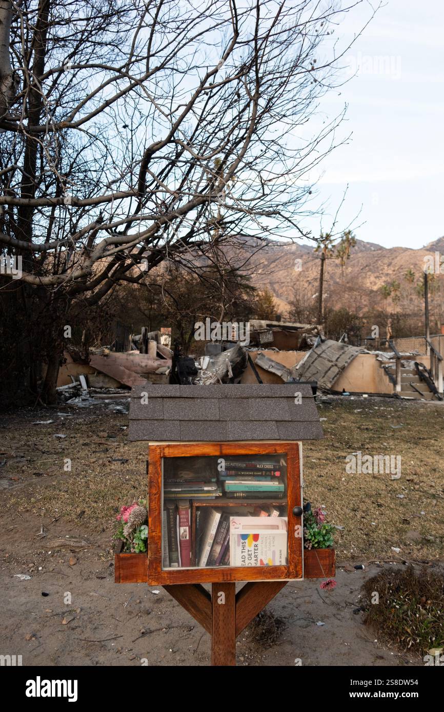 Altadena, USA. 21st Jan, 2025. Little free library left unscathed sits ...