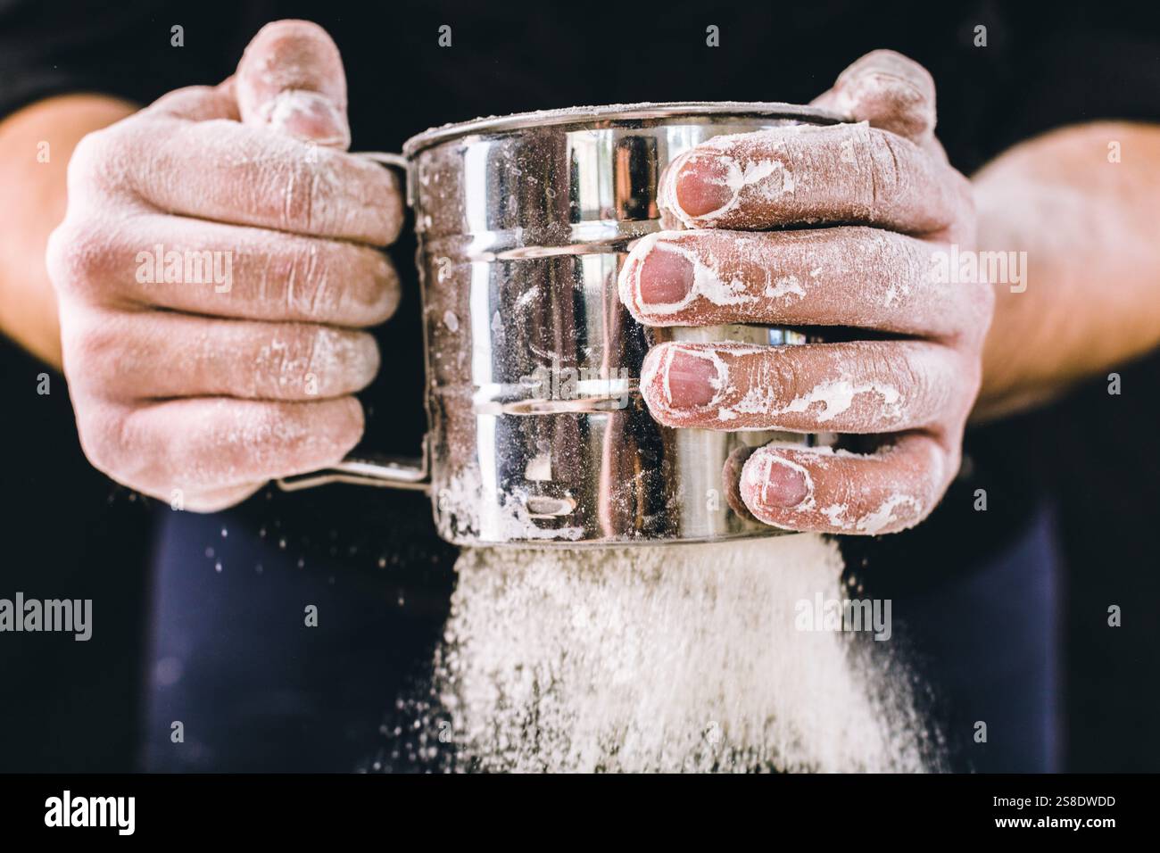 Chef hands dropping flour hi-res stock photography and images - Alamy