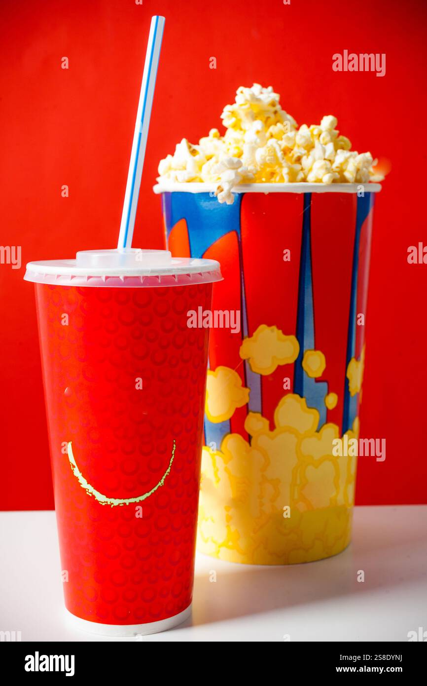Popcorn bowl and drink Stock Photo - Alamy