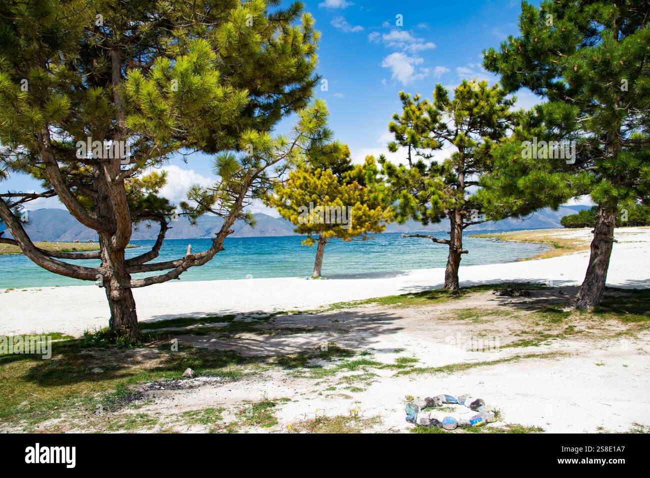 Sandy beach. Seaside vacation, golden beaches. Blue waters of the sea ...