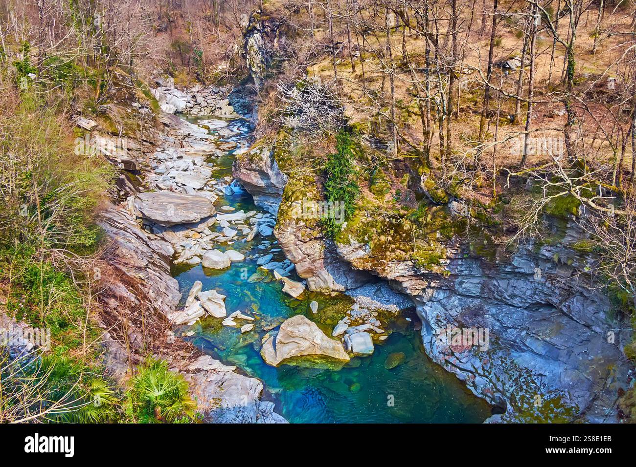 Panorama of the River Maggia rocky bottom with giant boulders and lush ...