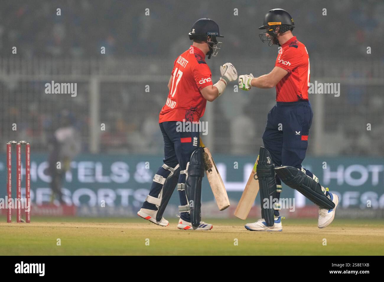 England's captain Jos Buttler, right, and batting partner Ben Duckett ...