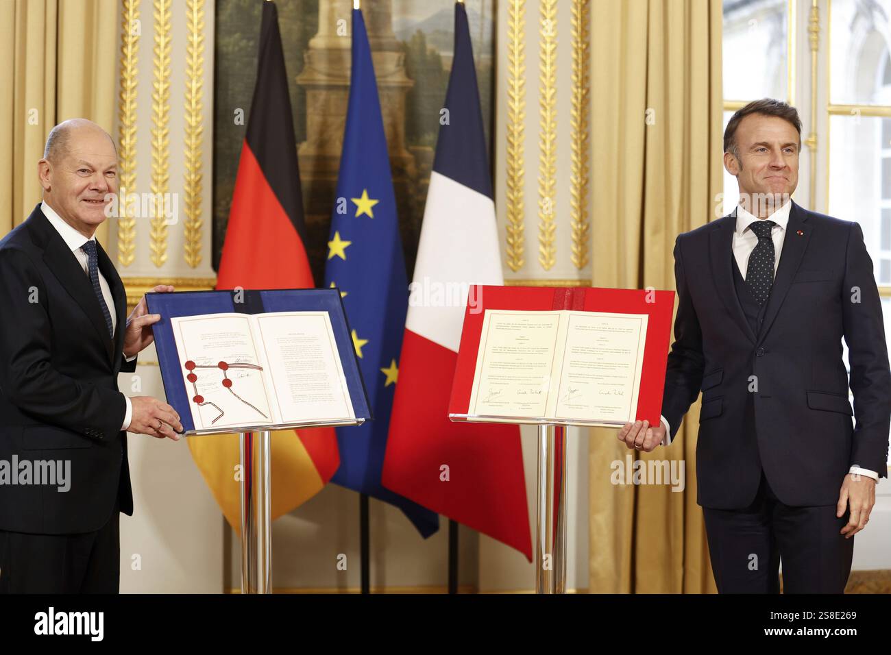 French President Emmanuel Macron, right, and German Chancellor Olaf ...