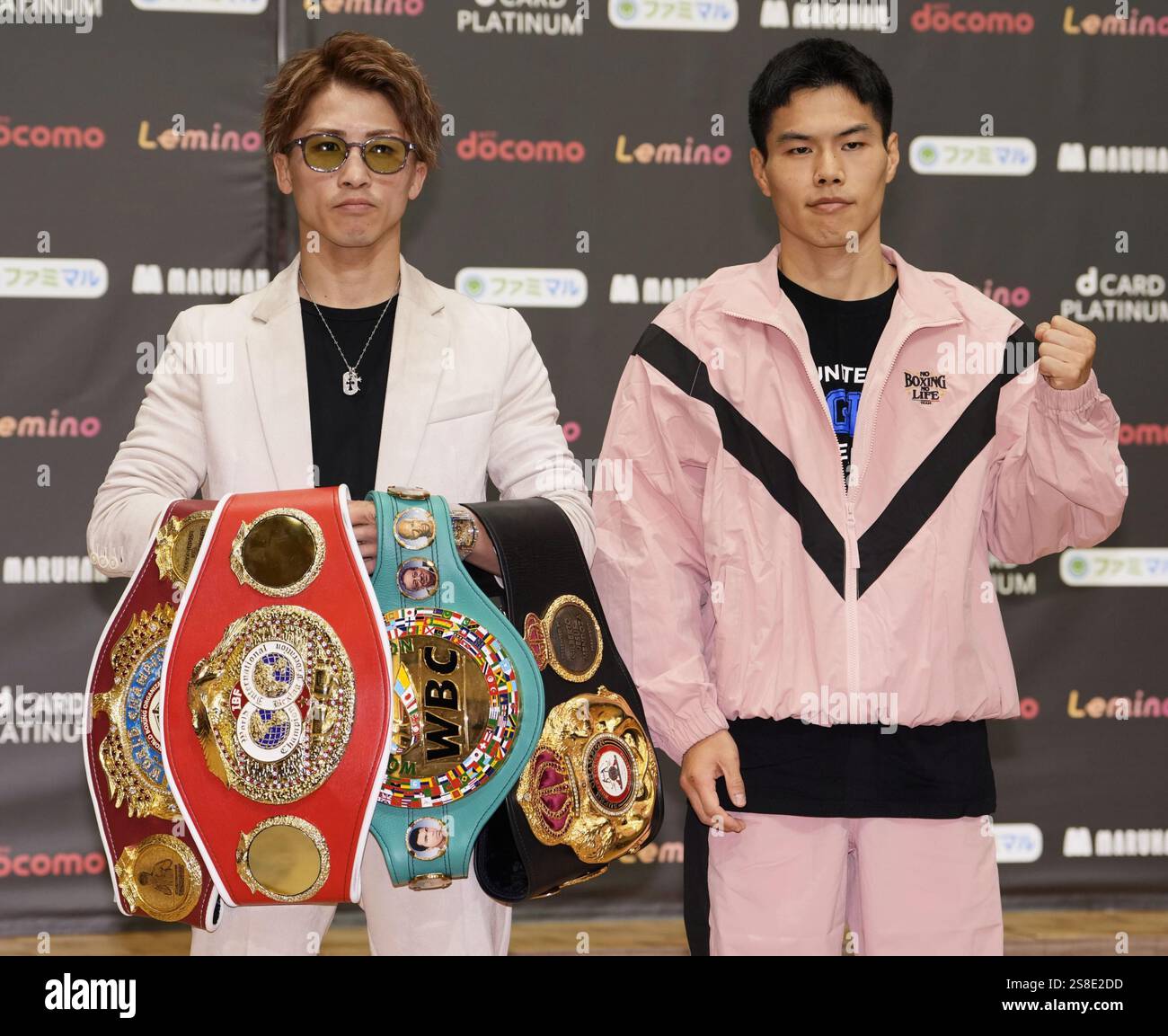 Japan's undisputed super bantamweight world champion Naoya Inoue (L ...