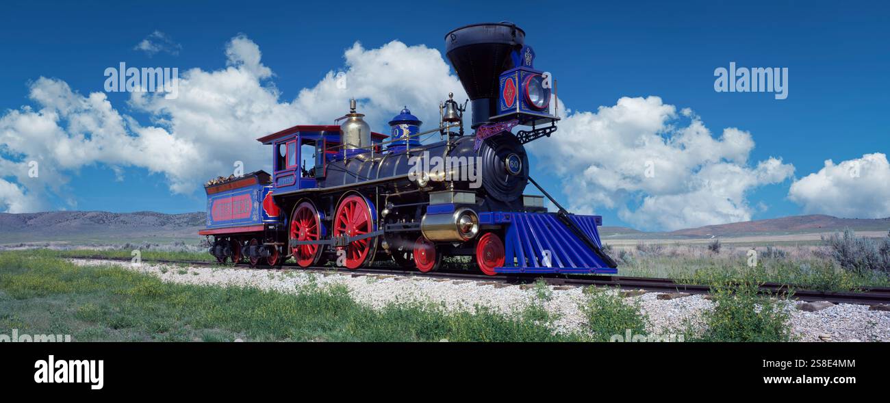 Train engine on a railroad track, Jupiter, Golden Spike National ...