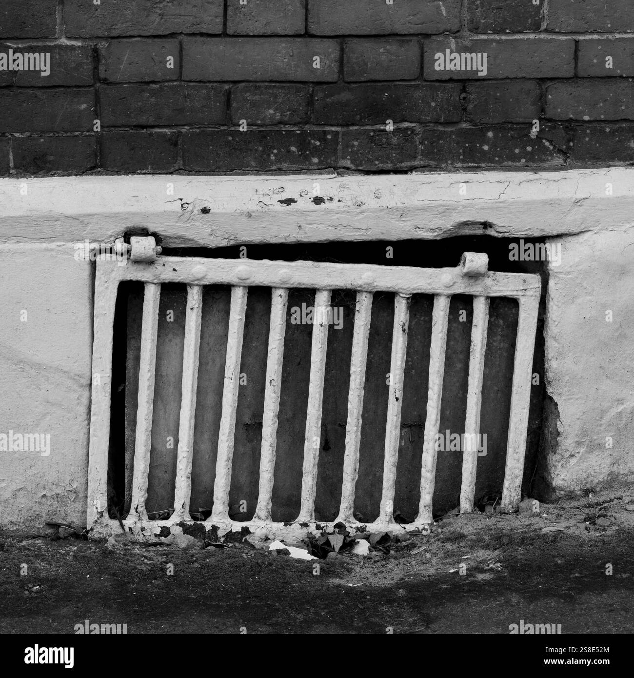 An old cellar grating, square, black and white Stock Photo - Alamy