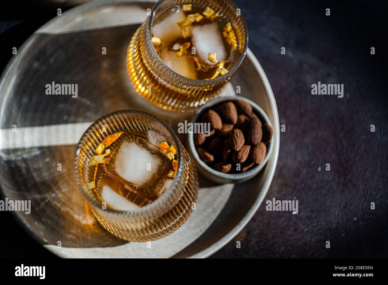 Top view of two spiced cognac-based cocktails with cinnamon and star ...