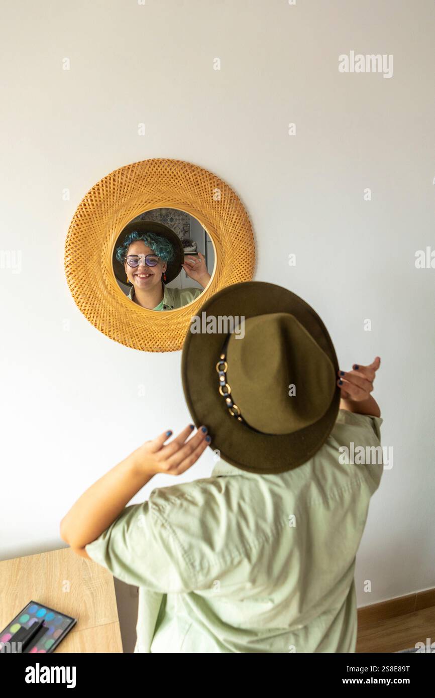A young transgender man, expressing his gender identity through fashion ...
