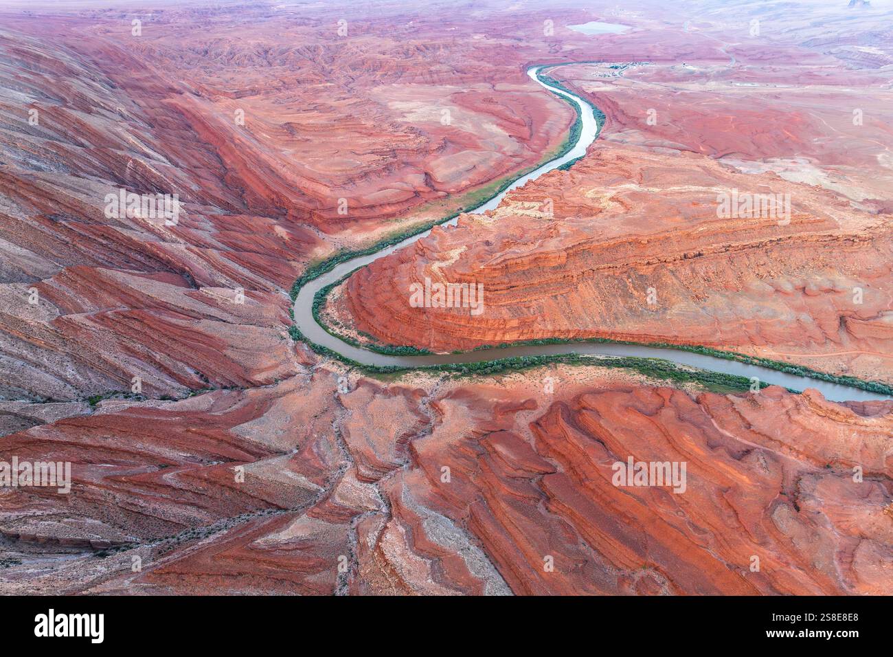 Aerial view of the serpentine Rio San Juan meandering through the stark ...