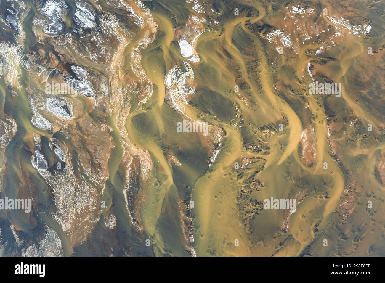 Aerial view of Iceland showcasing mesmerizing, abstract river patterns ...