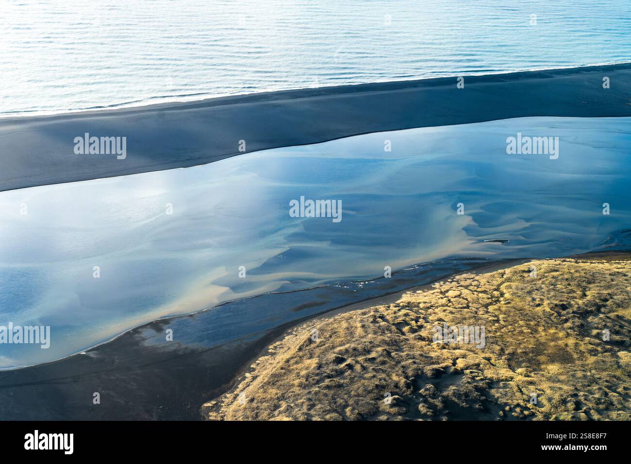 Stunning aerial view of a river delta blending into the sea on the ...