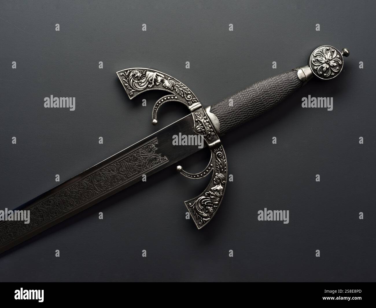 This image showcases a beautifully crafted Spanish steel sword ...