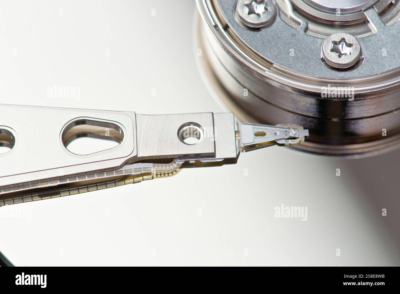 Detailed view of the arm mechanism of a hard drive including the read ...