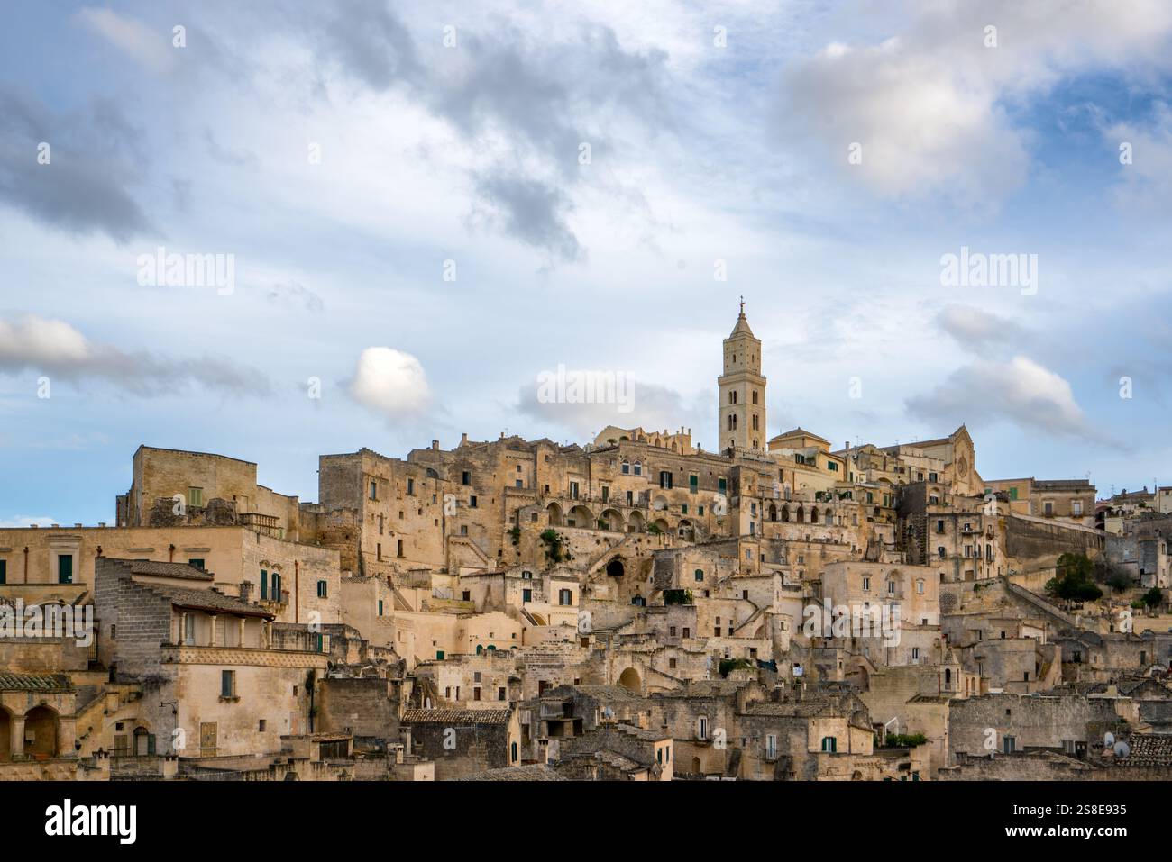 Stunning view of Matera's ancient stone city, crowned by the Maria ...