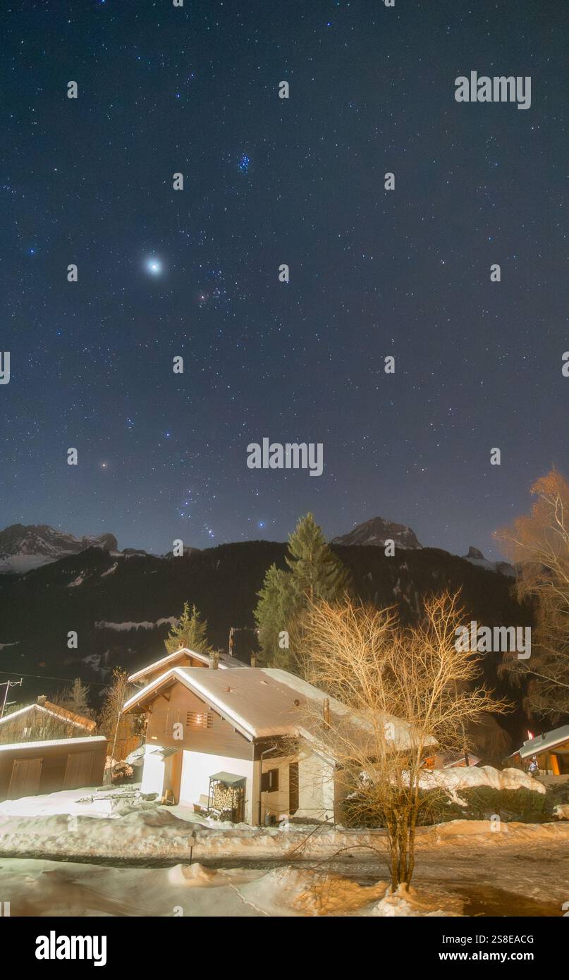 A starry night sky showcases the constellations of Orion and Taurus ...