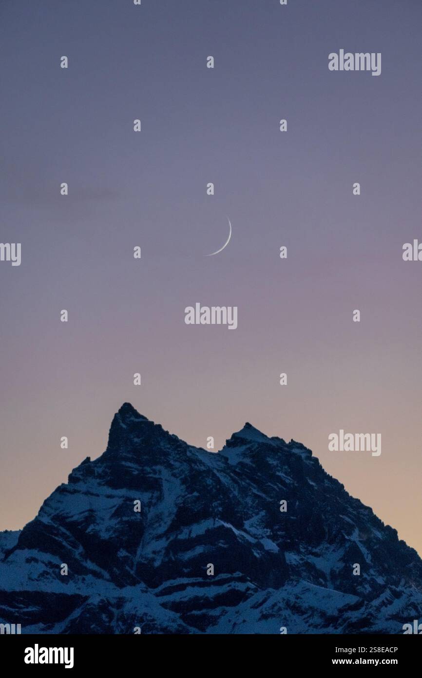 The crescent Moon graces the sky above the majestic Dents du Midi ...